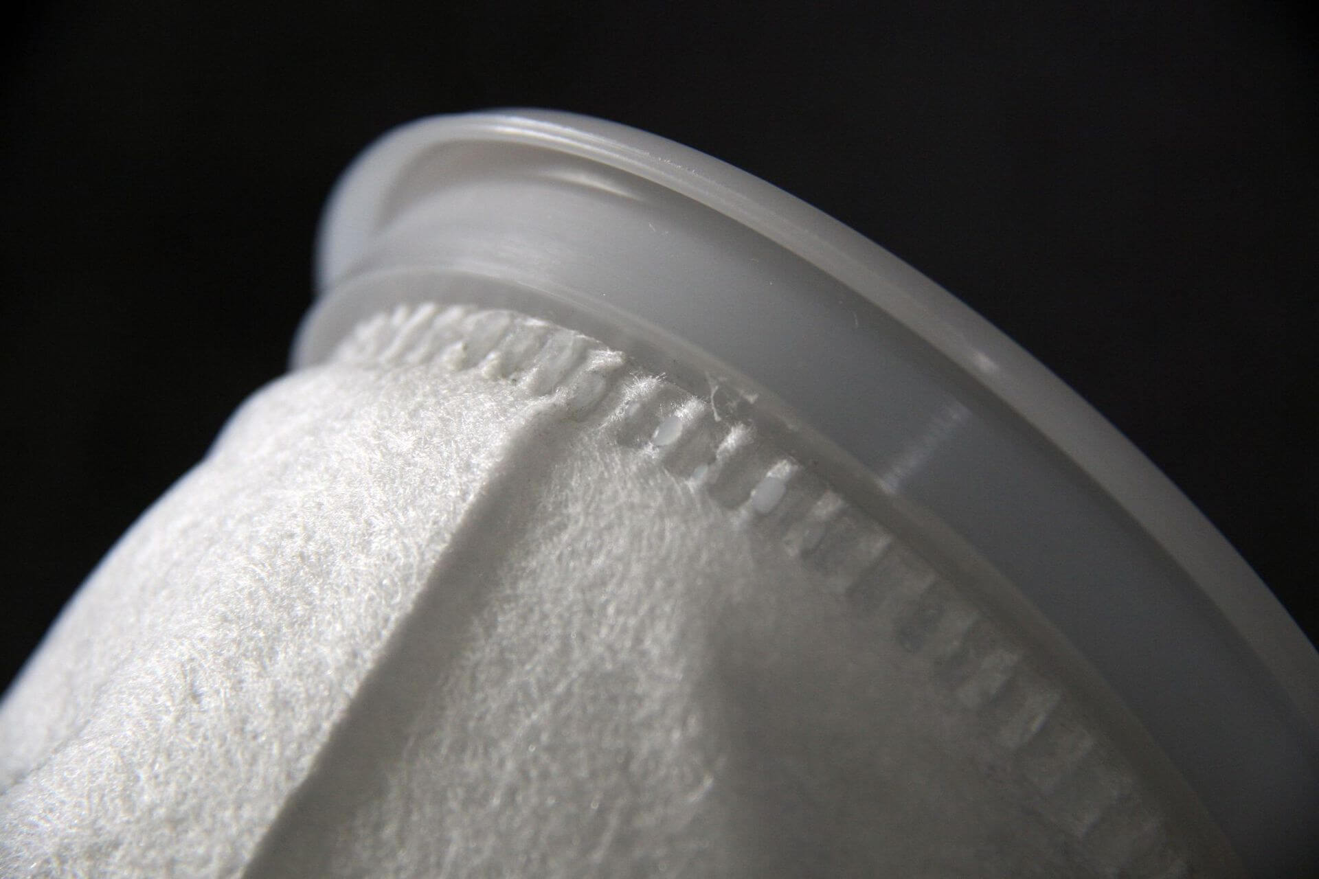 Filter bags for industrial filtration of liquids